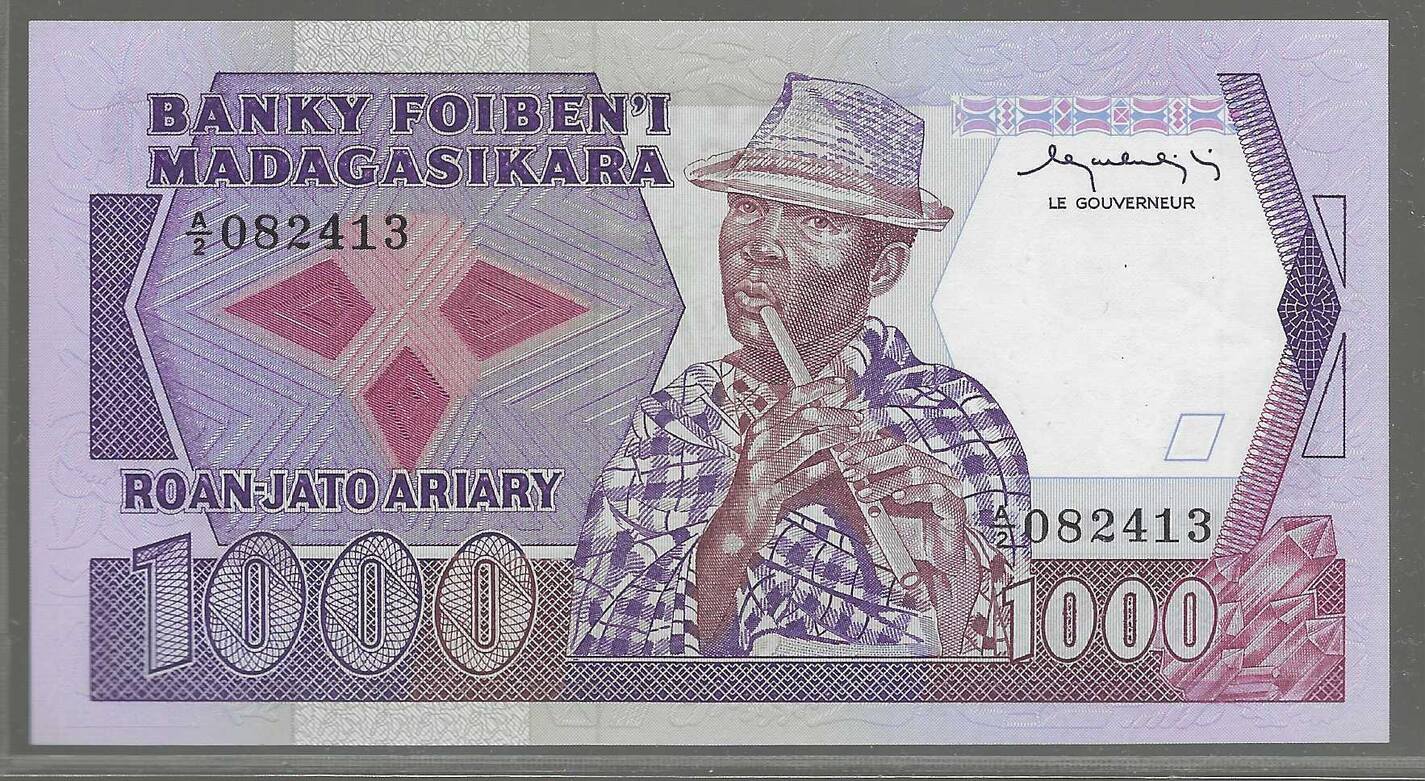 MADAGASIKARA/MADAGASCAR. 1000 Francs. (1988) Junger madagassischer Mann ...