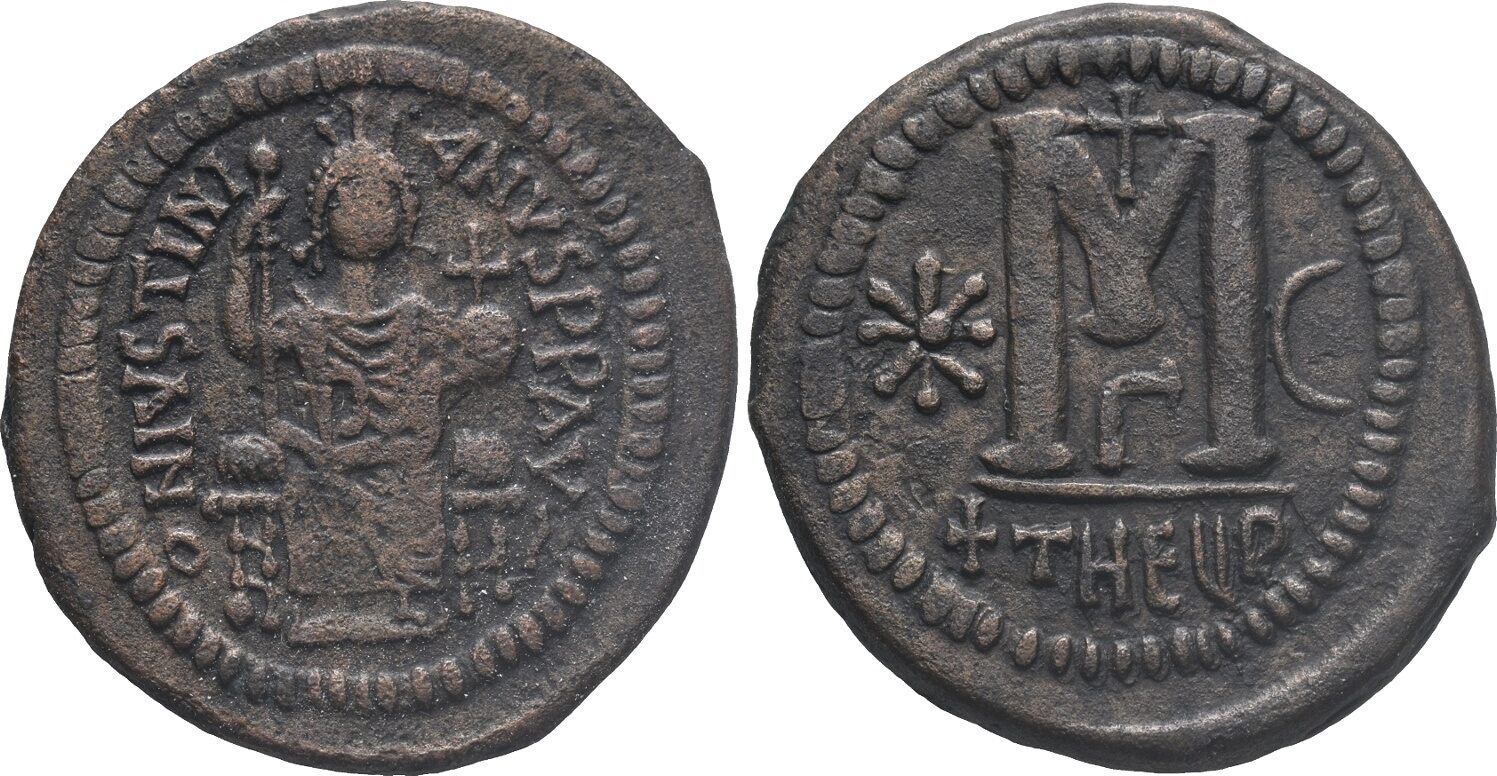 Theoupolis, follis Struck circa 531-537. Justinian seated facing on ...